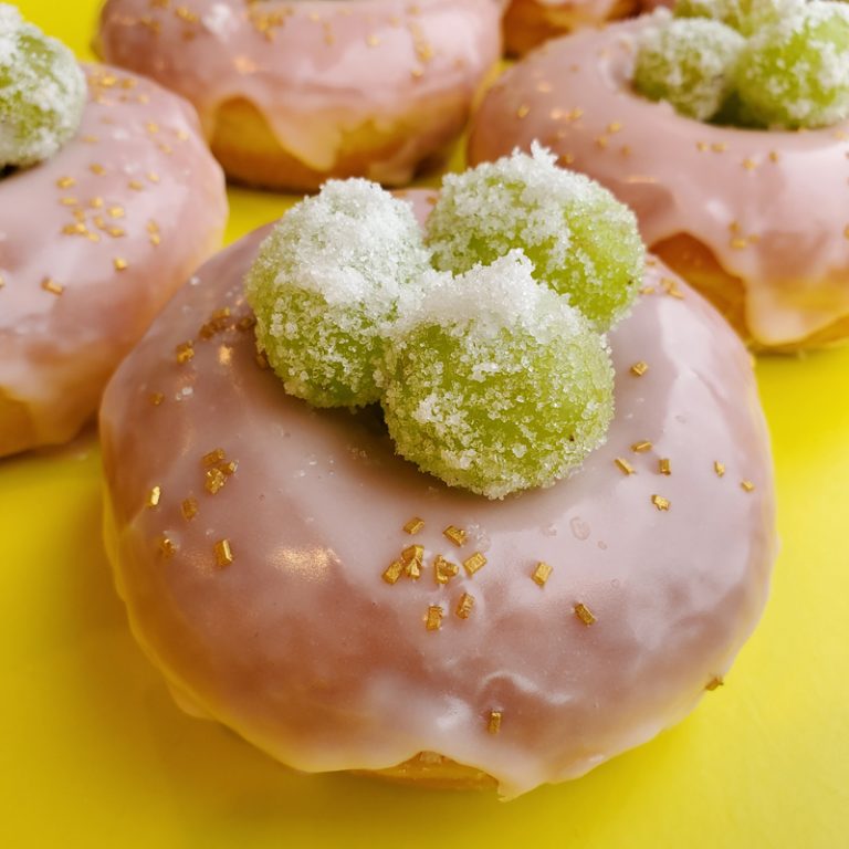 Rosé champagne icing Donut topped with Green Grapes. – Jarams Donuts ...